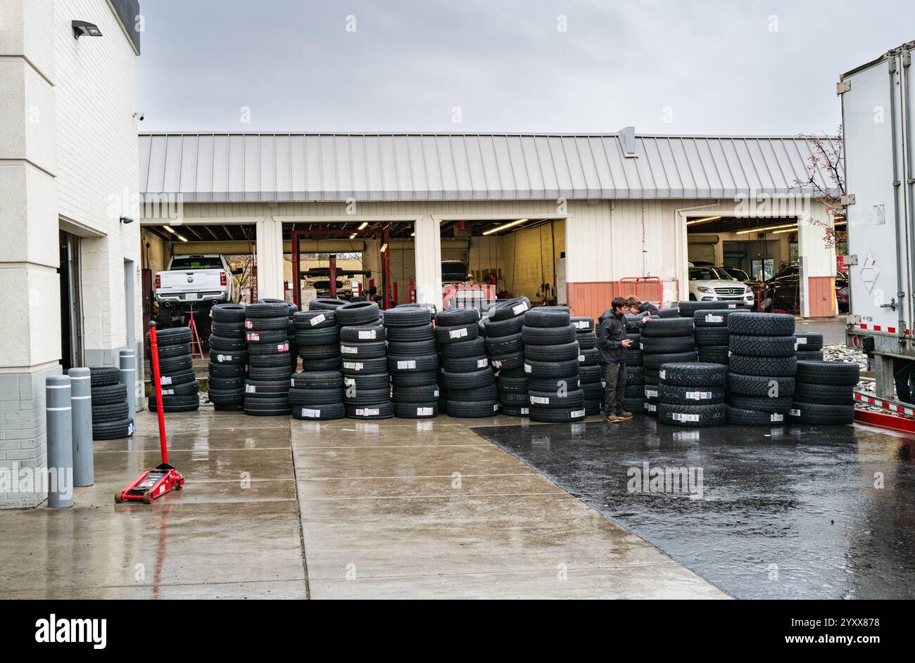 A large delivery of automotive tires at an America's Tire location ...