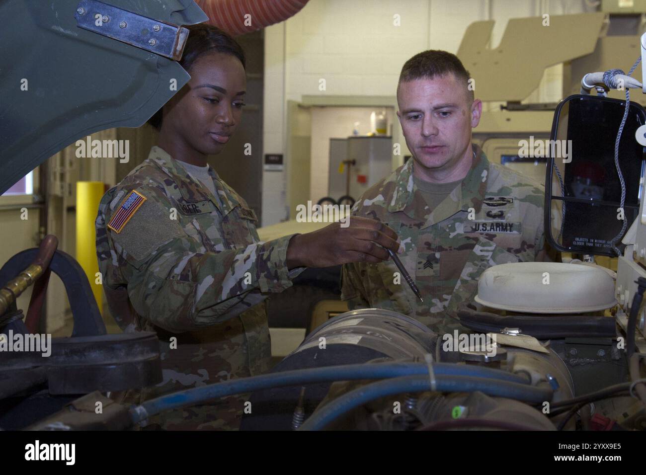 Deshauna Barber and Sgt Justin Lake tour the motor pool at the Army ...