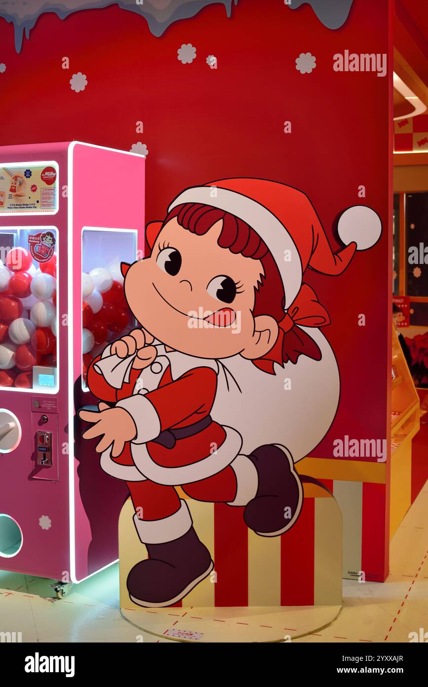 Peko Chan the Fujiya confectionery mascot in Santa Claus costume Stock ...