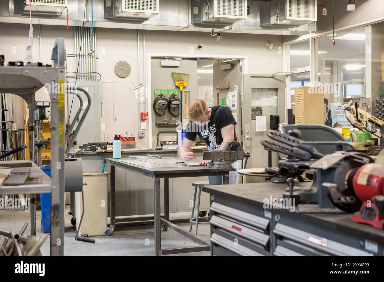 Students and instructors working in a university architecture school ...