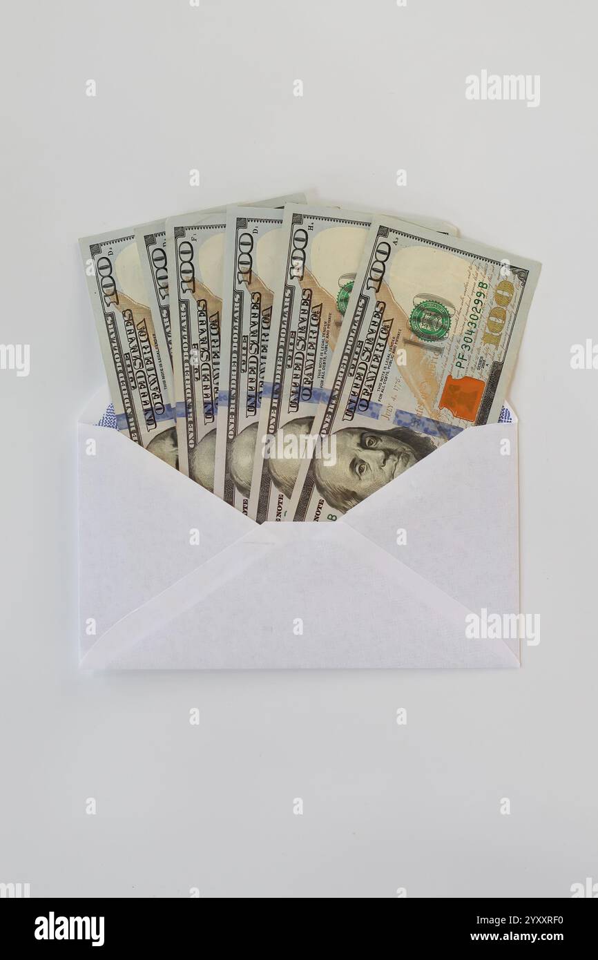Dollar bills in white envelope hi-res stock photography and images - Alamy