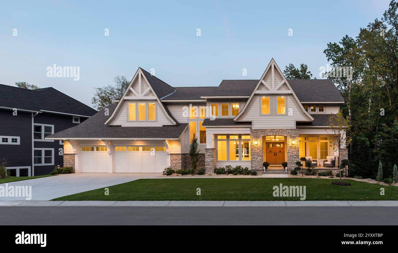 New house with two gables and stone accents on the front Stock Photo ...
