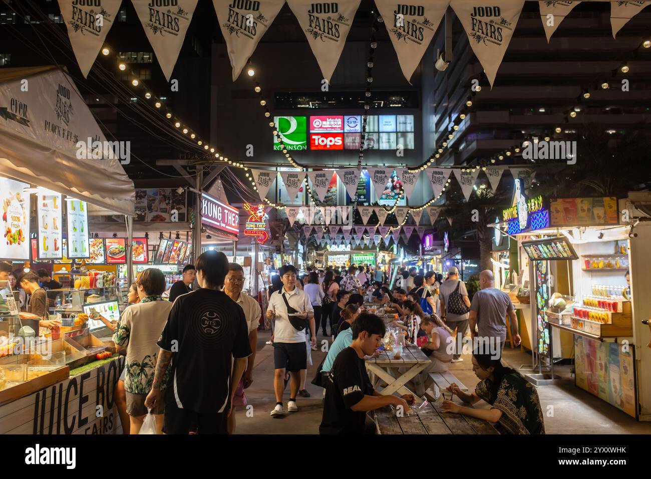 Bangkok, Thailand - December 9, 2024: People at the Jodd Fair's night ...