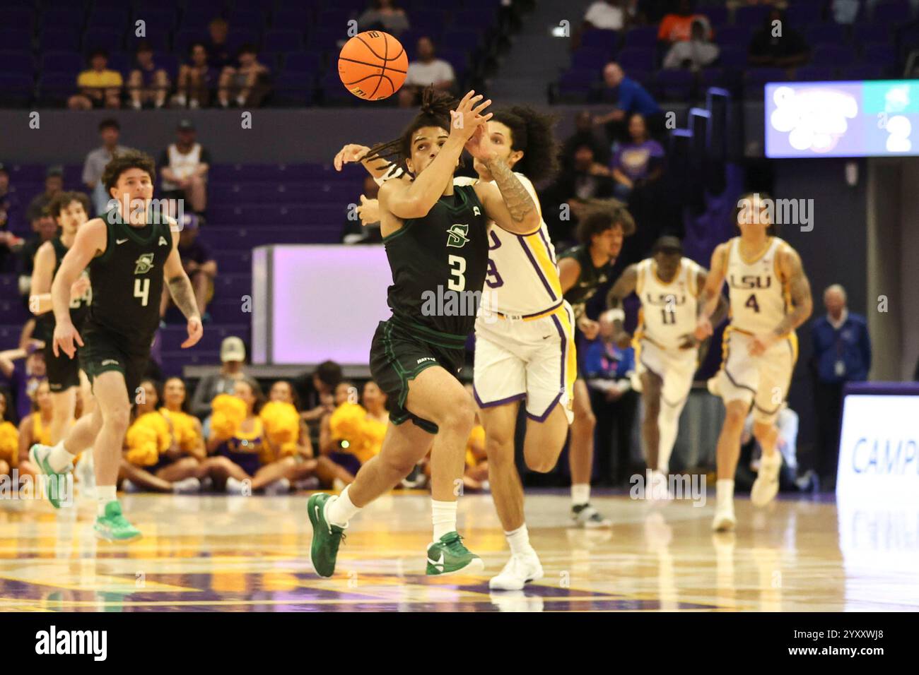 Stetson Hatters guard Mehki Ellison (3) and LSU Tigers guard Curtis ...