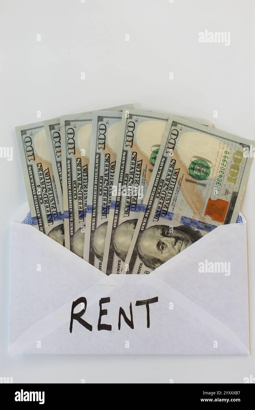 Rent money in envelope, budgeting concept Stock Photo - Alamy