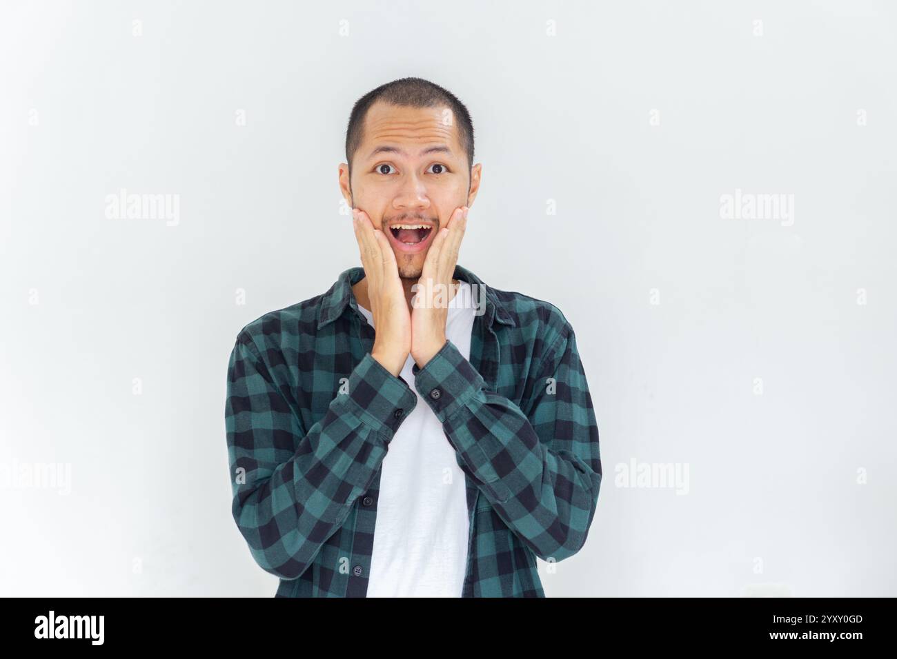 Young Adult Asian men wearing flannel and shirt shocked with smiling ...