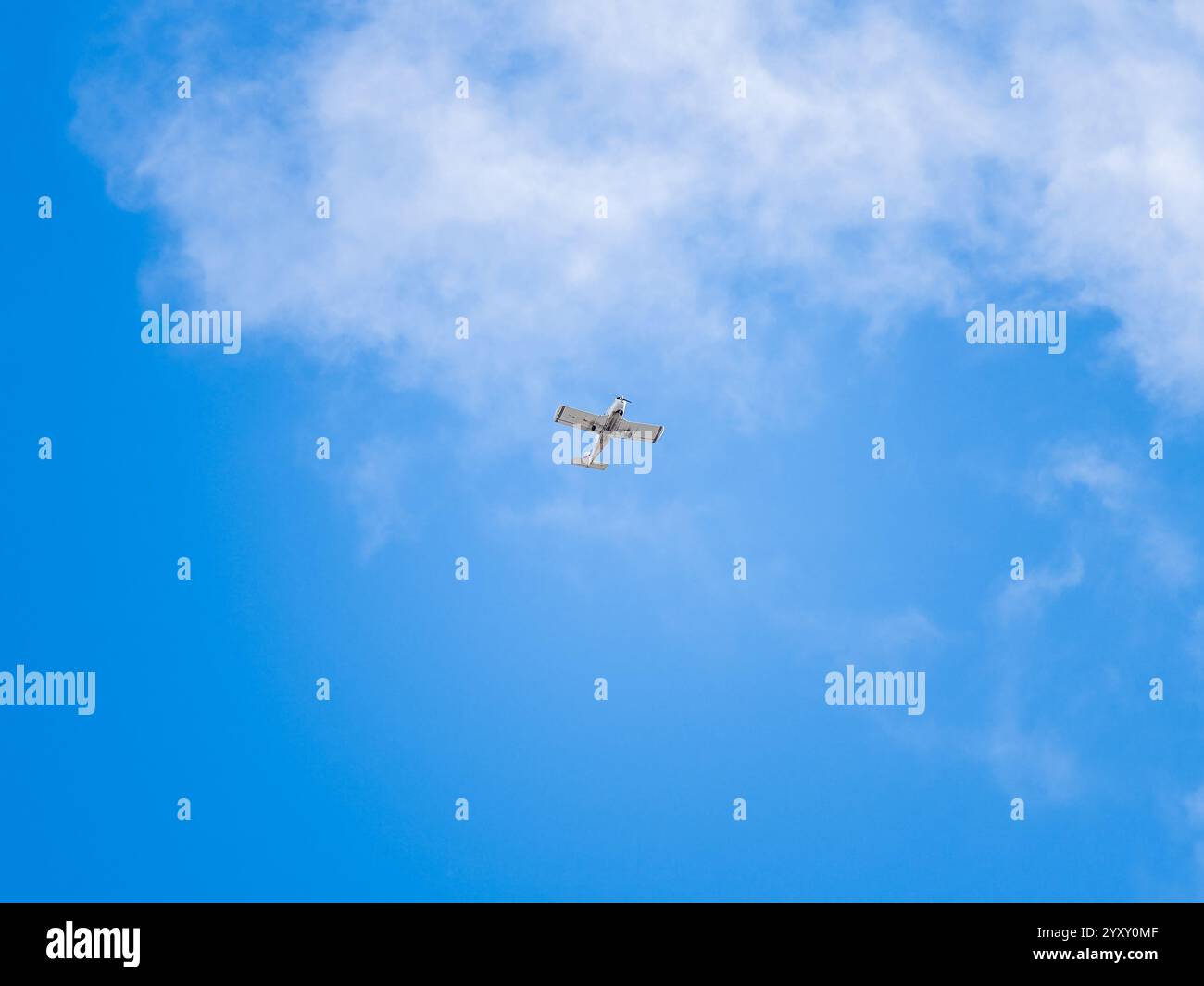 Small ultralight airplane with overhead wing and single propeller ...