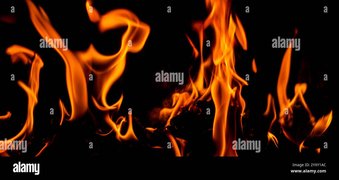 Fire flame background. Hell bonfire. Texture of fire on a black ...