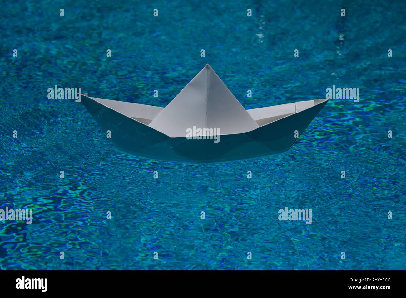 Paper boat sailing on water. Origami ship boat. Paper boat into water ...