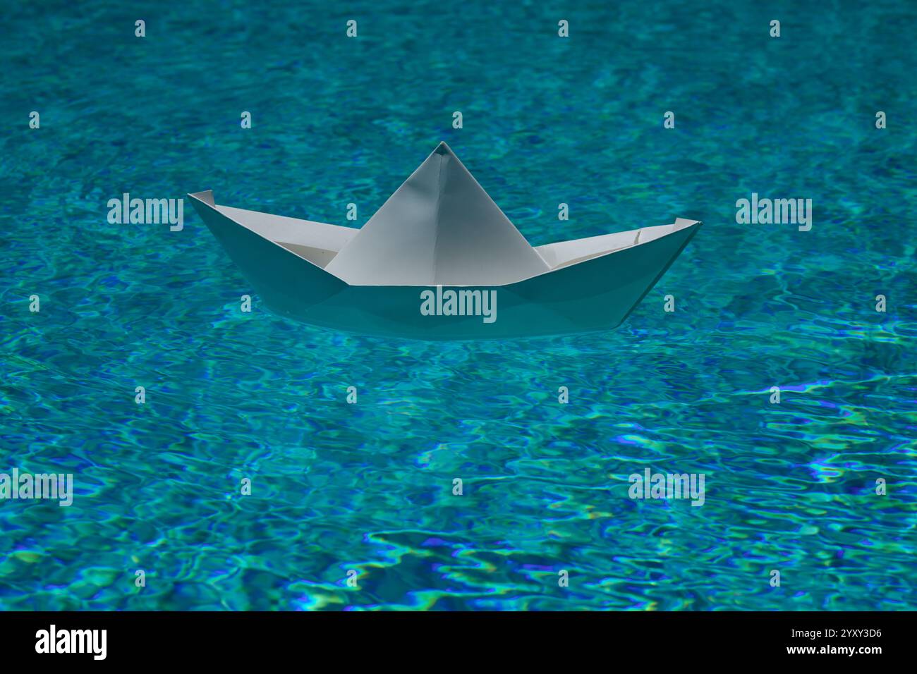 Paper boat sailing. Summer traveling. Sail boat. Summertime vacation ...