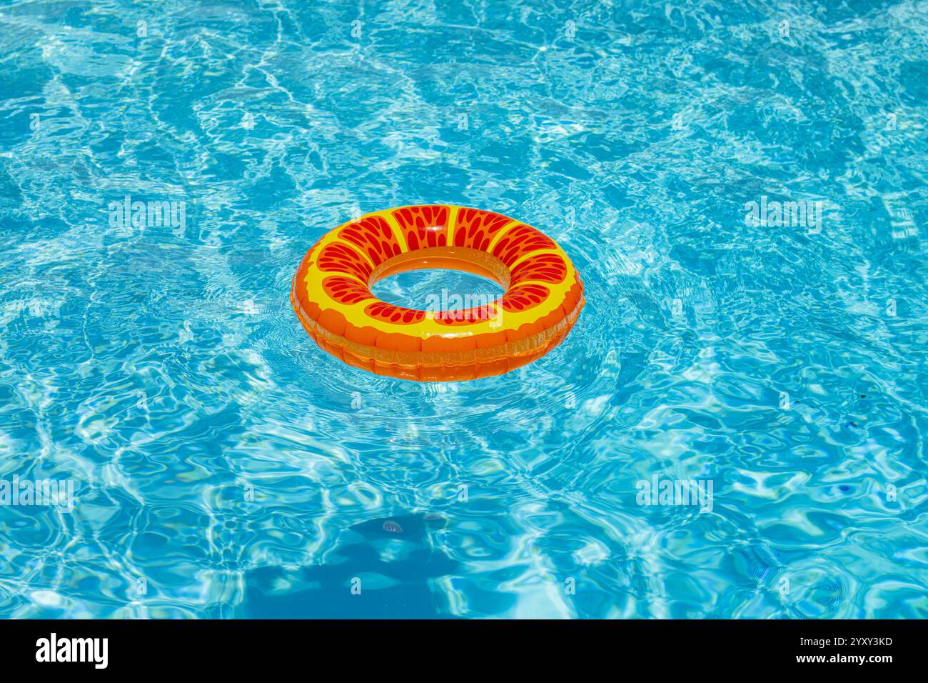Ring float in swimming pool. Summer background. Summer backdrop ...