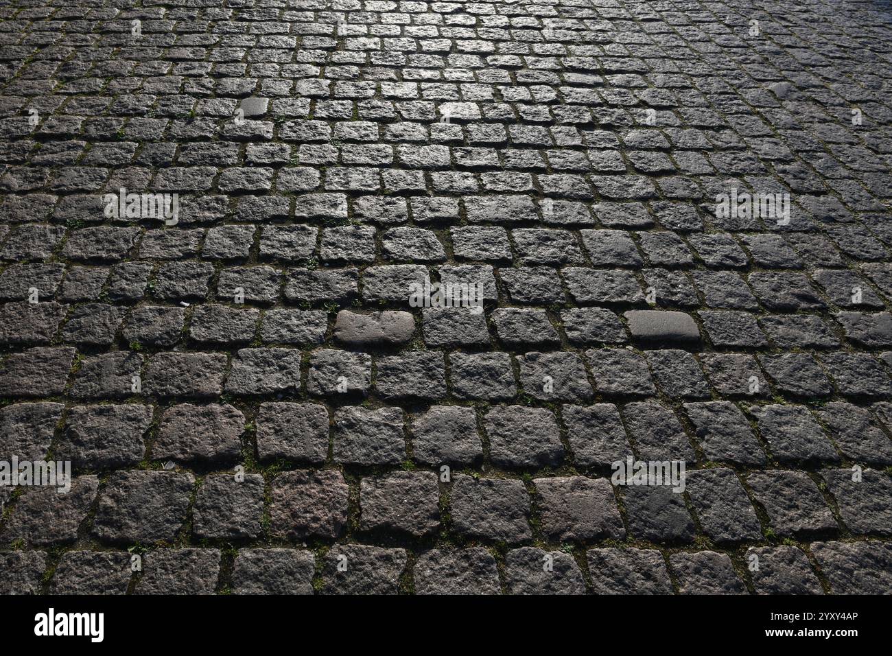 Stone road background texture. Textured background of cobblestone road ...