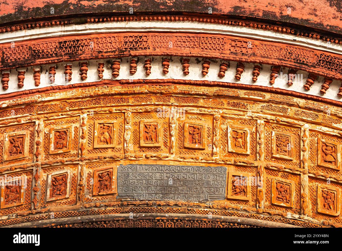 Terracotta carvings of Hindu deities and inscriptions detailing the ...