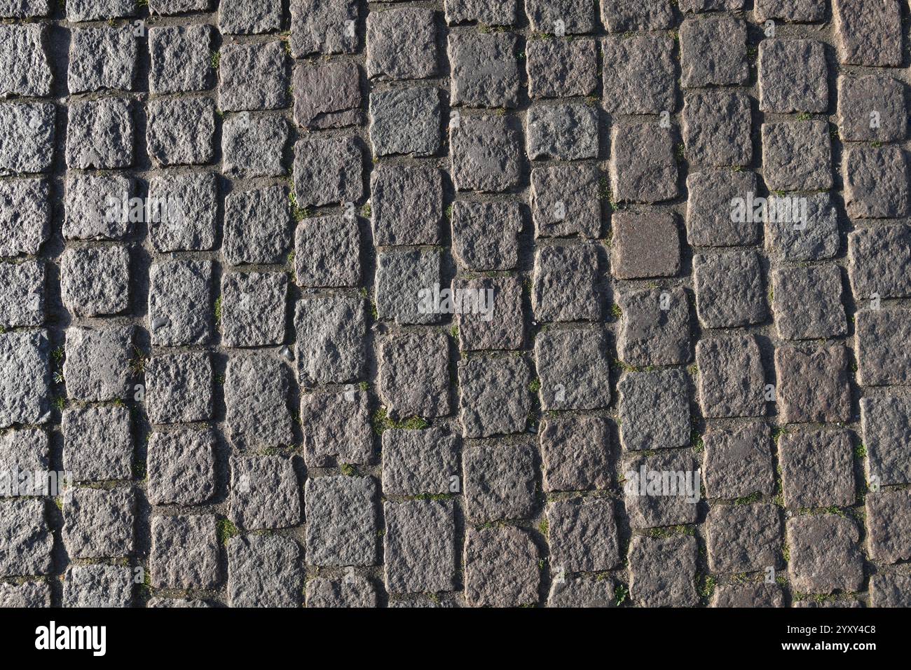 Stone road background texture. Textured background of cobblestone road ...