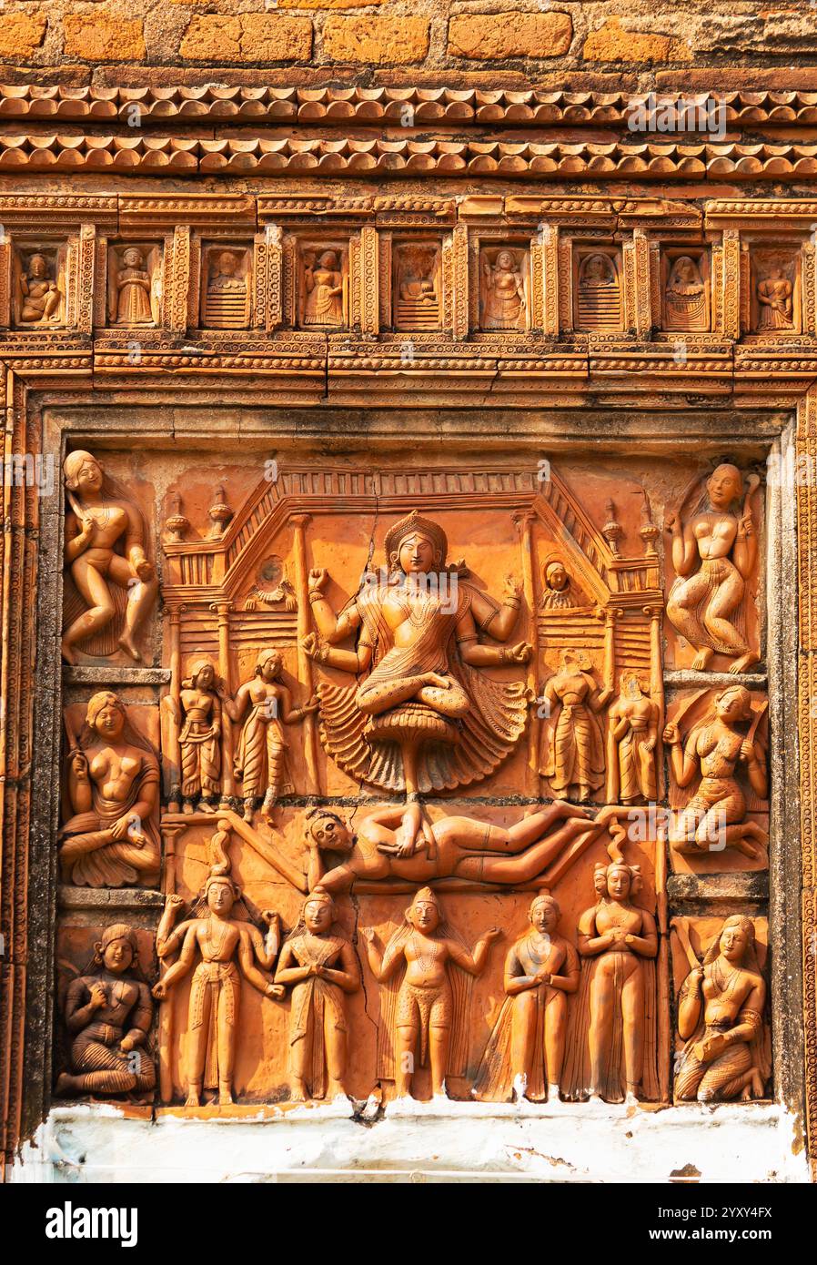 Terracotta sculpture of Tripura Sundari Goddess sitting on a lotus ...