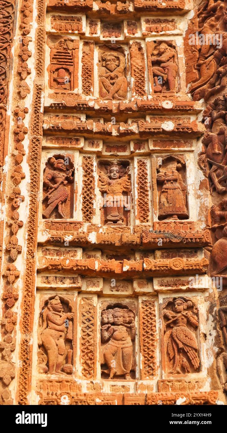 Terracotta carvings depicting mythological stories on the side facades ...