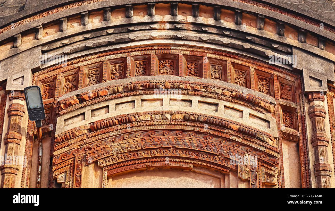 Exquisite carvings of Hindu deities in the upper panels of the Shiva ...