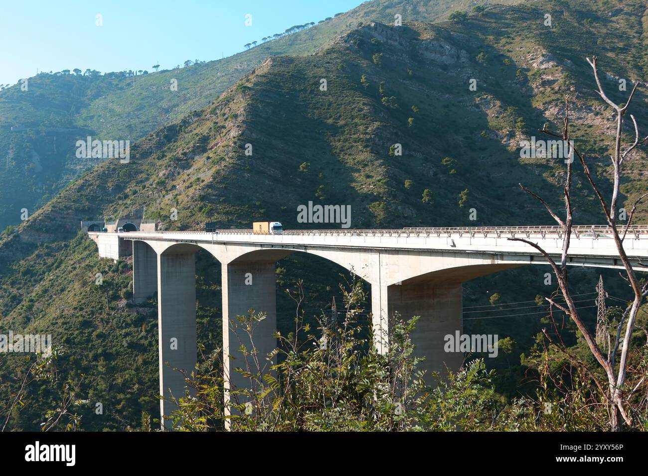 Mountain and highway bridge in Liguria. Nature and building structures ...