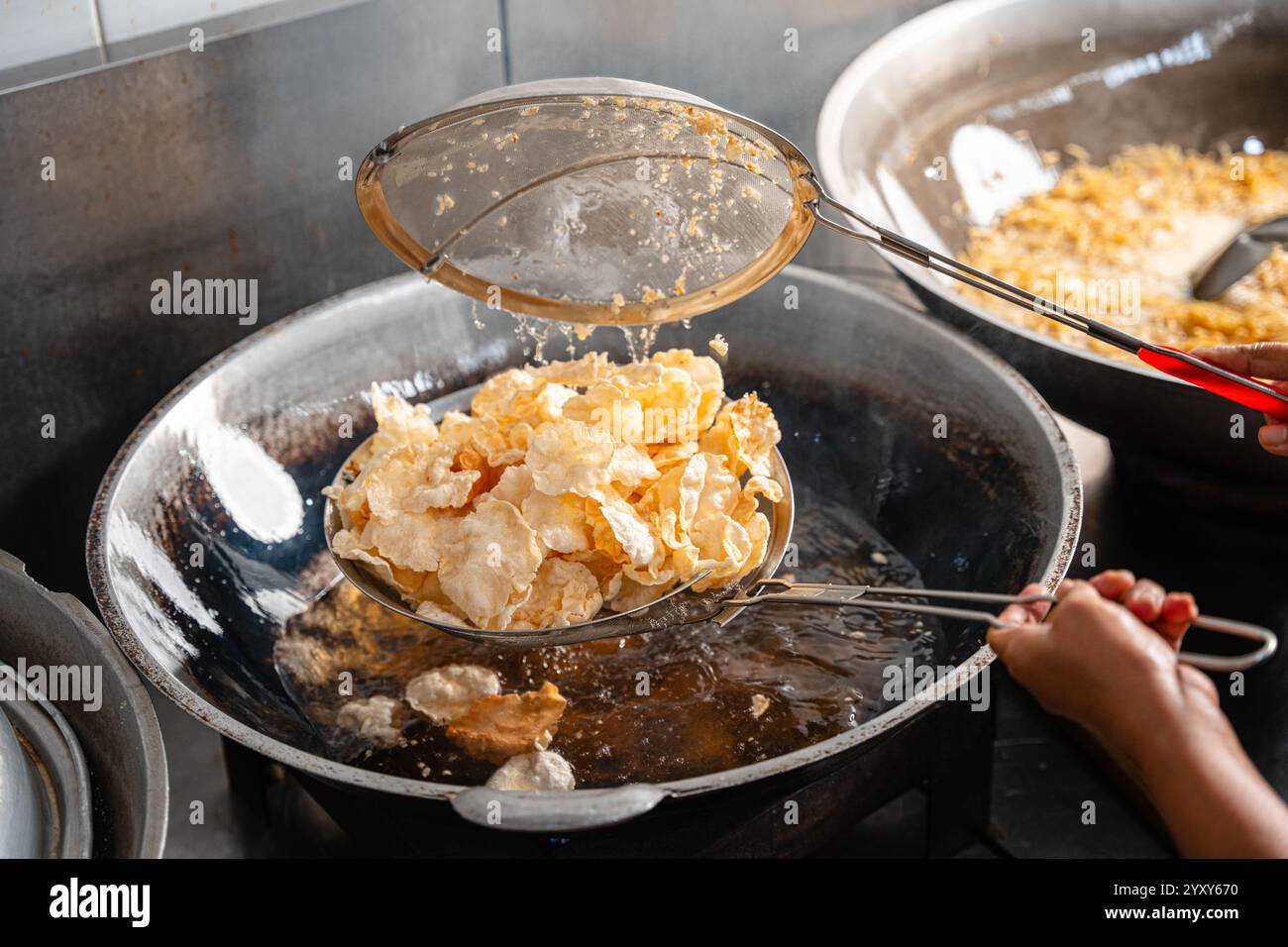 making process Emping Balado, Spicy Snacks from West Sumatra. Made from ...