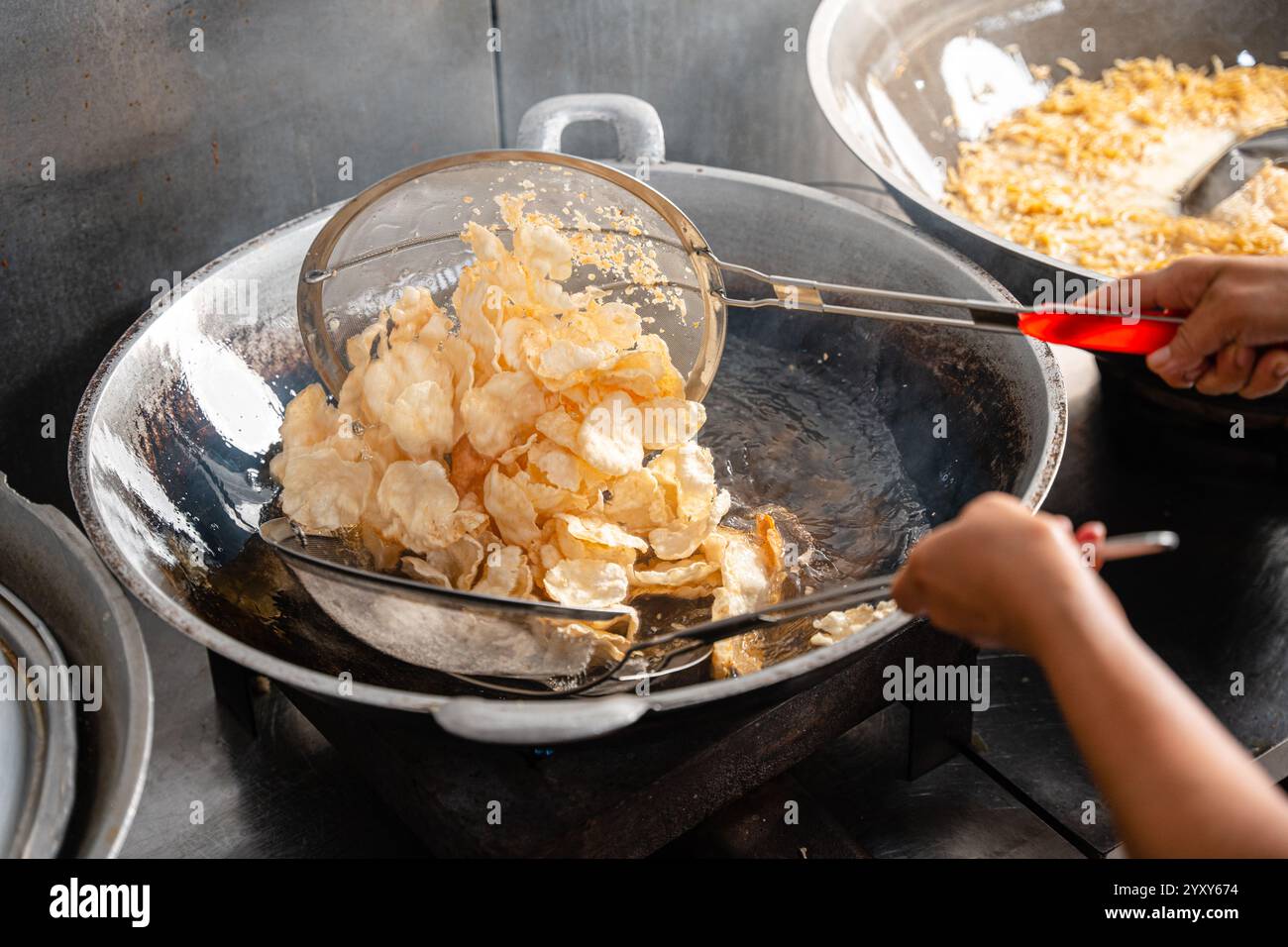 making process Emping Balado, Spicy Snacks from West Sumatra. Made from ...