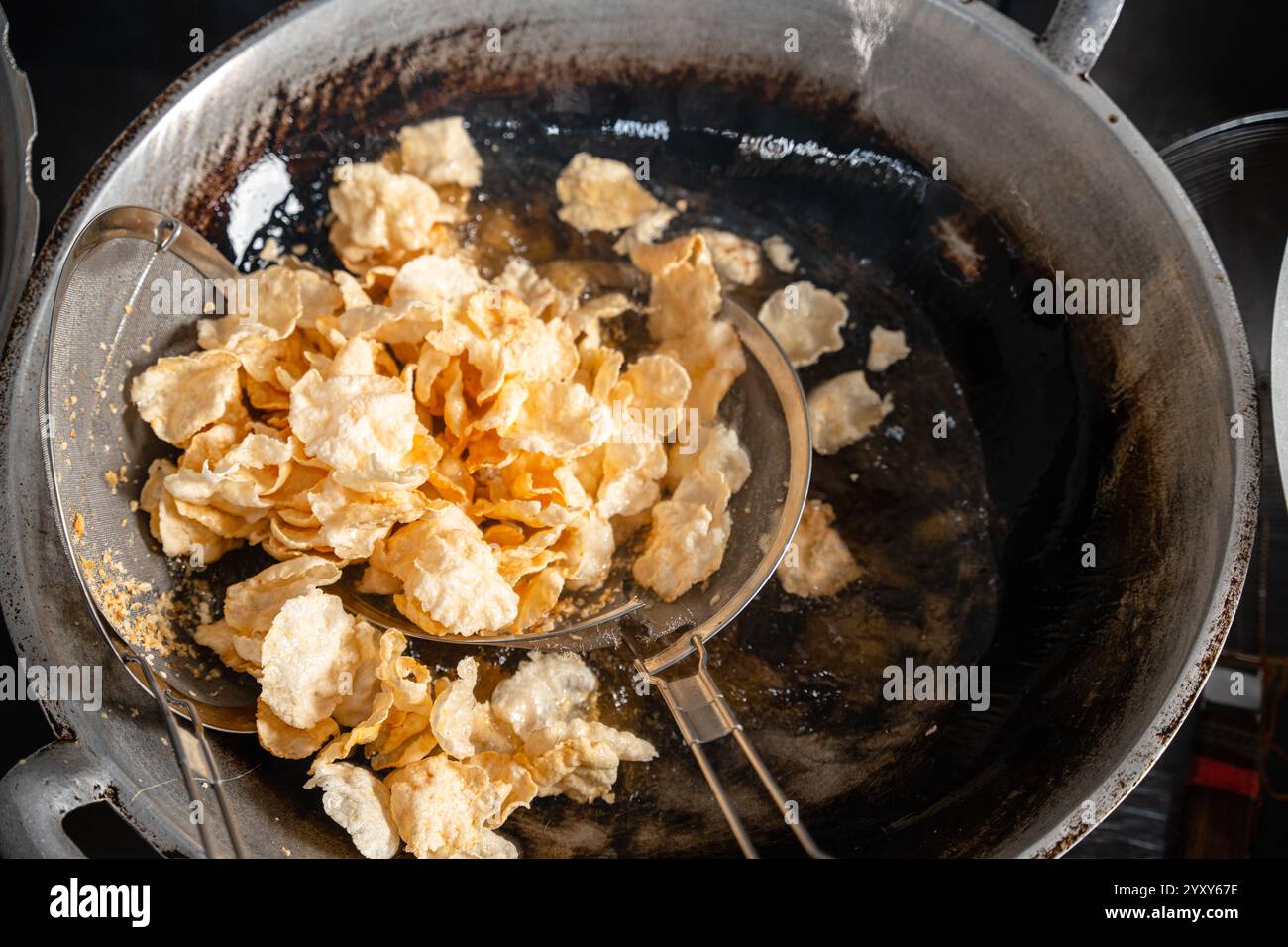 making process Emping Balado, Spicy Snacks from West Sumatra. Made from ...