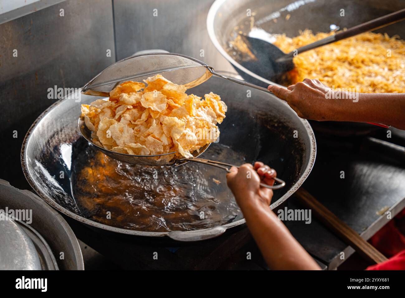 making process Emping Balado, Spicy Snacks from West Sumatra. Made from ...
