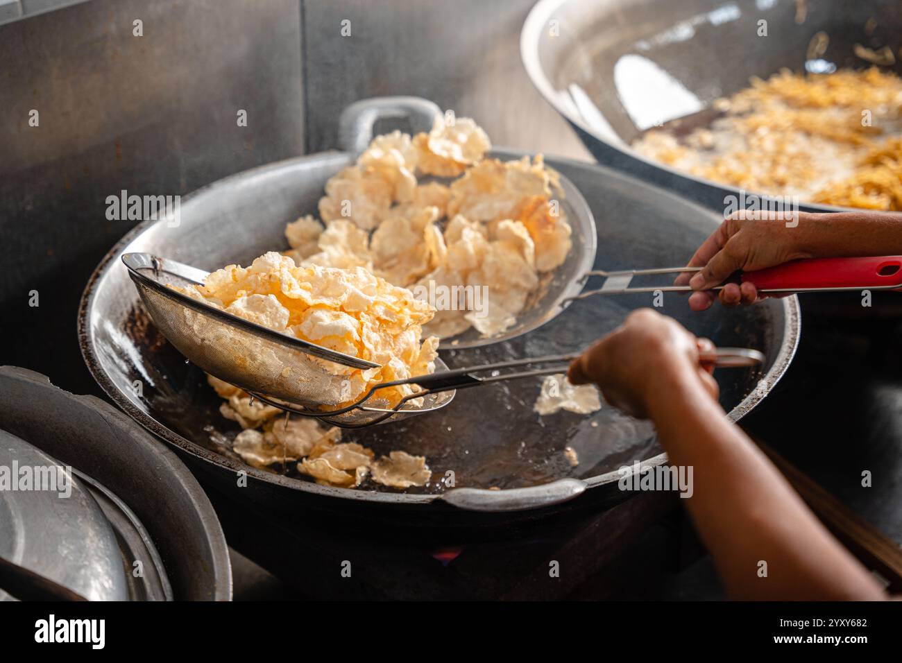 making process Emping Balado, Spicy Snacks from West Sumatra. Made from ...