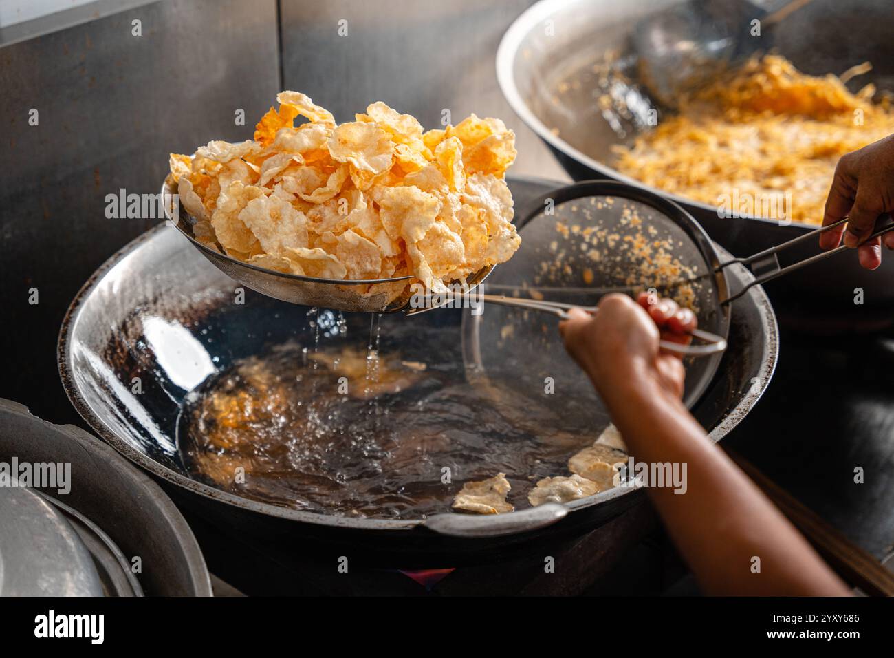 making process Emping Balado, Spicy Snacks from West Sumatra. Made from ...
