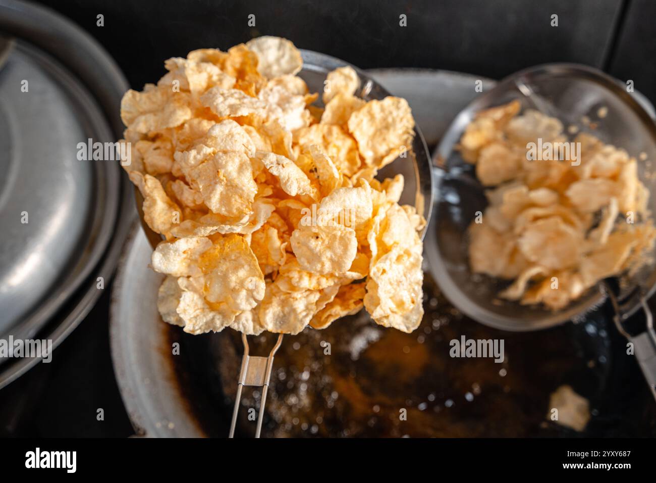 making process Emping Balado, Spicy Snacks from West Sumatra. Made from ...