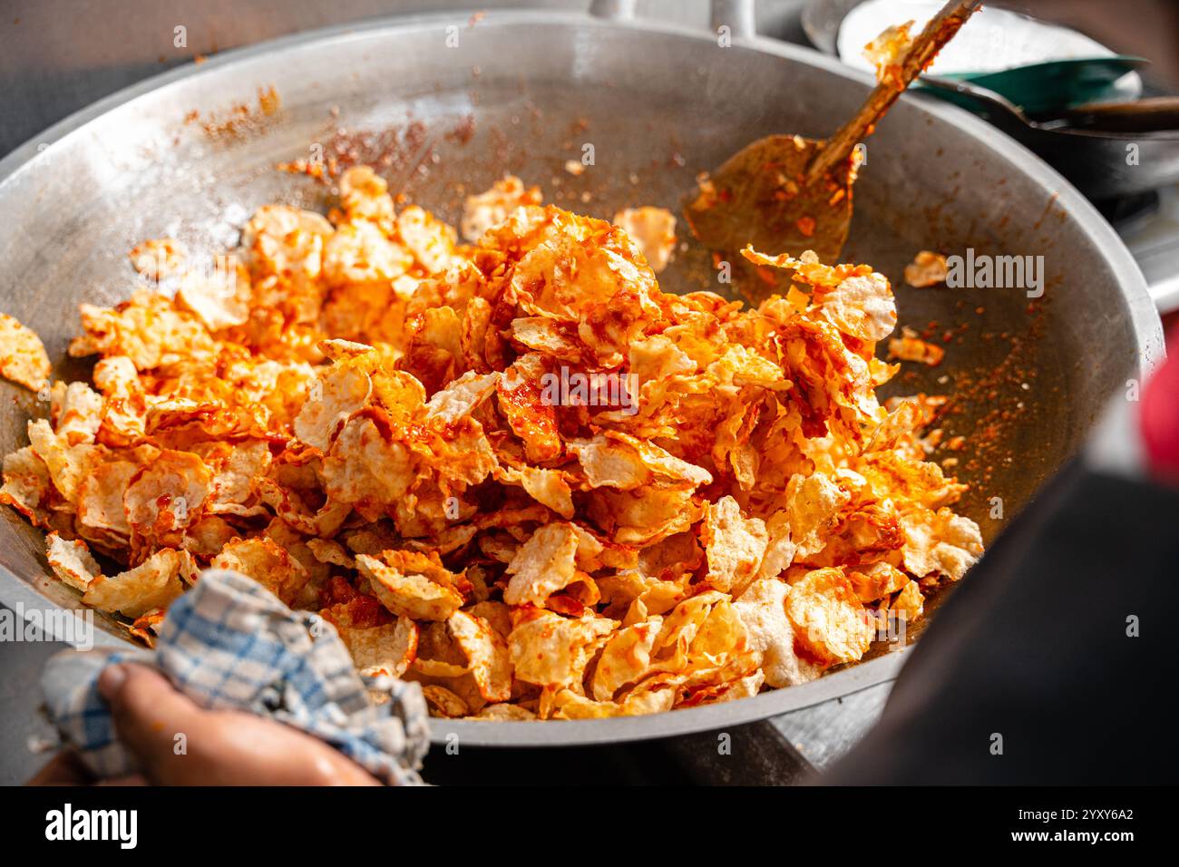 making process Emping Balado, Spicy Snacks from West Sumatra. Made from ...