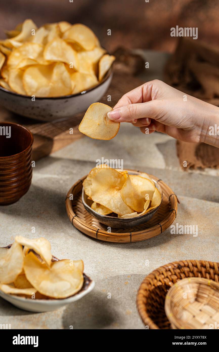 Cassava chips, a traditional Indonesian snack, are made from thin ...
