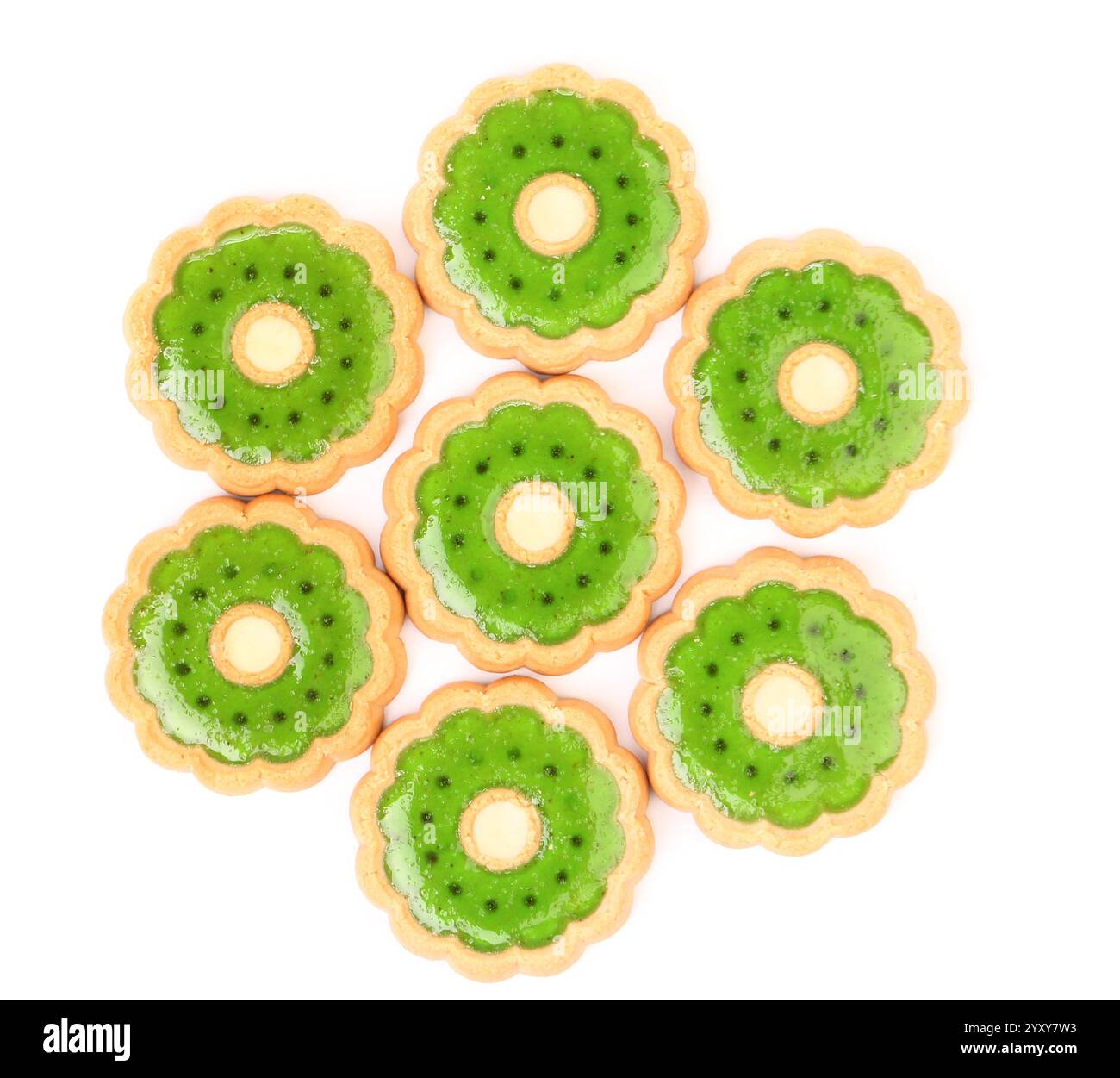 Hexahedron of biscuit with kiwi jam. White background Stock Photo - Alamy