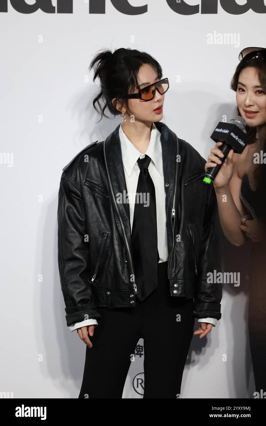 Chinese actress and singer Yang Zi attends an activity in Shanghai ...