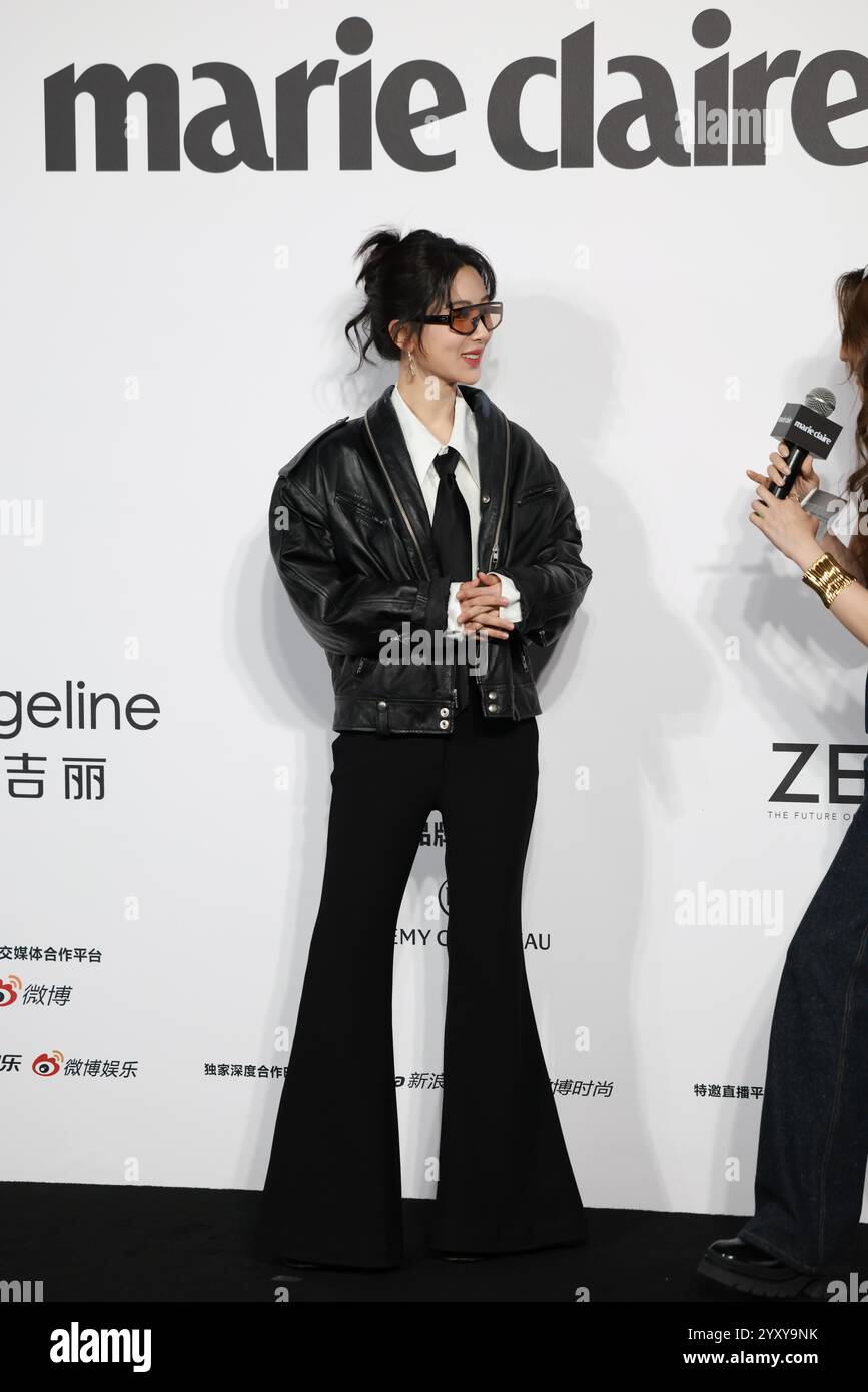 Chinese actress and singer Yang Zi attends an activity in Shanghai ...
