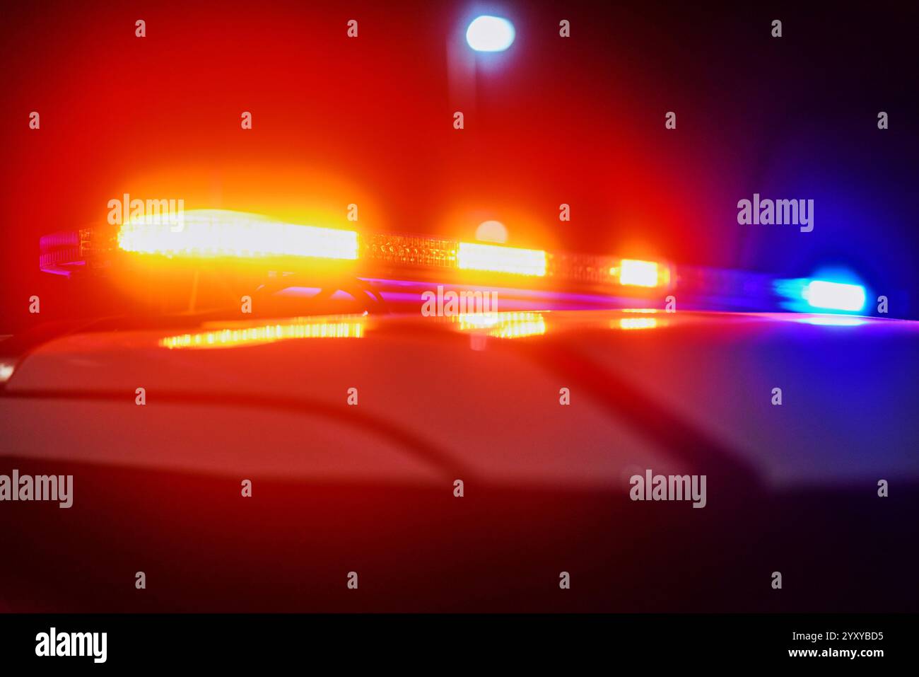 Night, police car and lights in city for emergency, public safety and ...