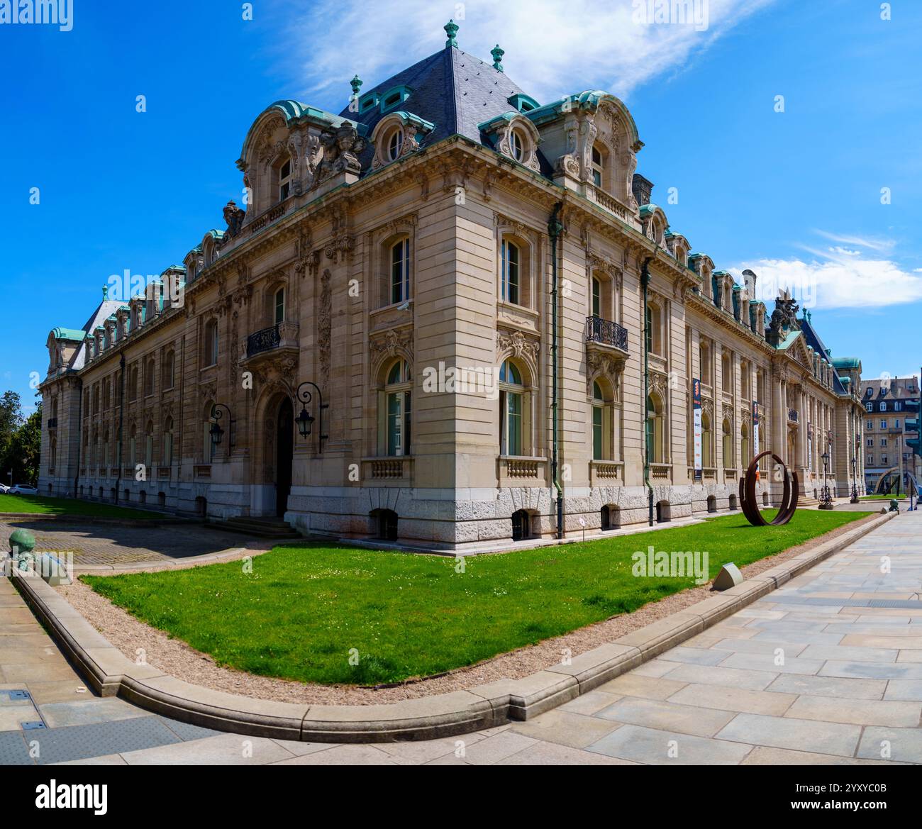 Corner view of the beautiful historical Cercle cite building in ...