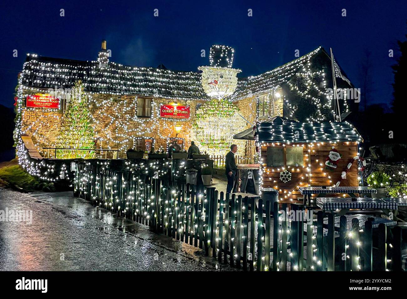 Christmas decorations, including a tree and snowman made from empty ...