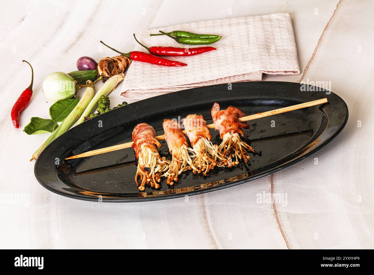Thai Street foof satay with bacon and mushroom enoki skewer Stock Photo ...