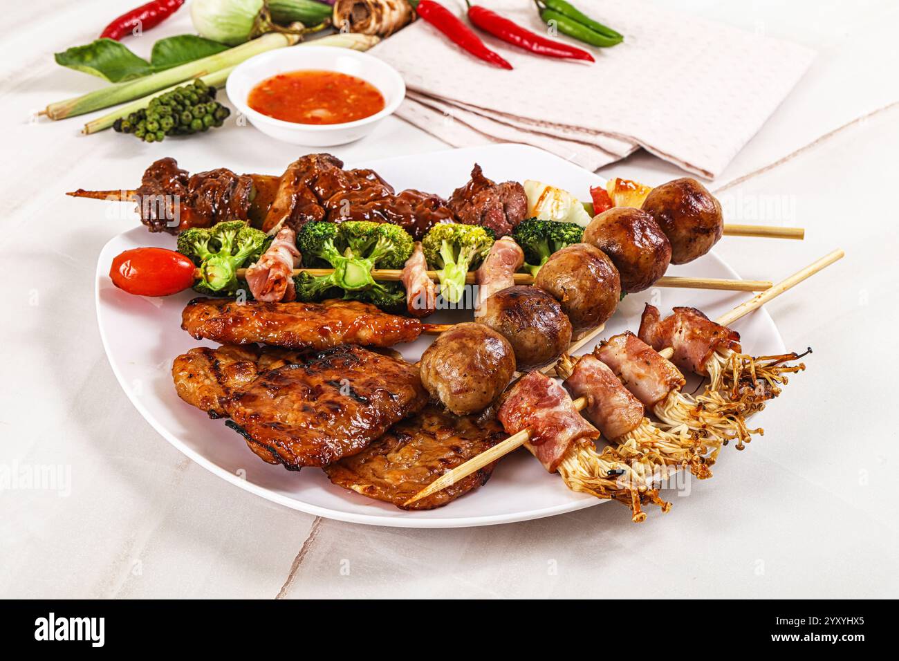 Asian grilled skewer assortment satay with beef, porl, chicken and ...