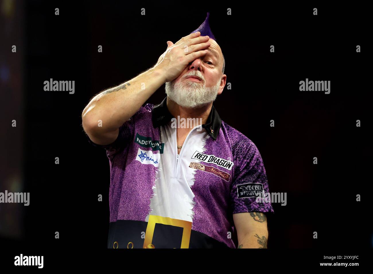 Peter Wright reacts after winning his second round match against Wesley ...