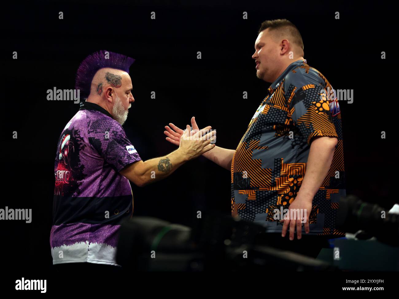 Peter Wright and Wesley Plaisier (right) after their second round match ...