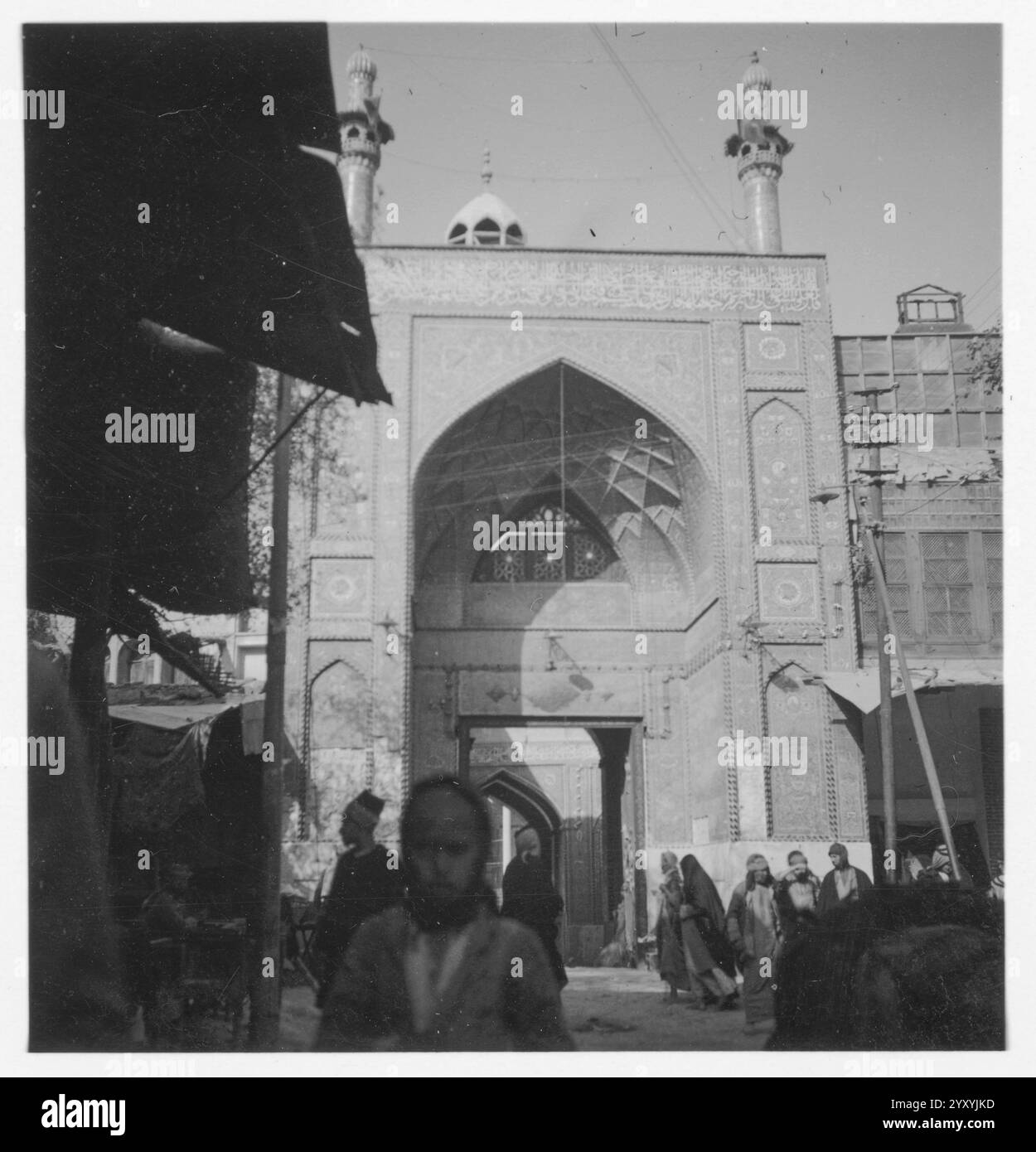 Iraq, Kadimein (Kazimiyya): mosque gate; Door with passers-by. Archive ...