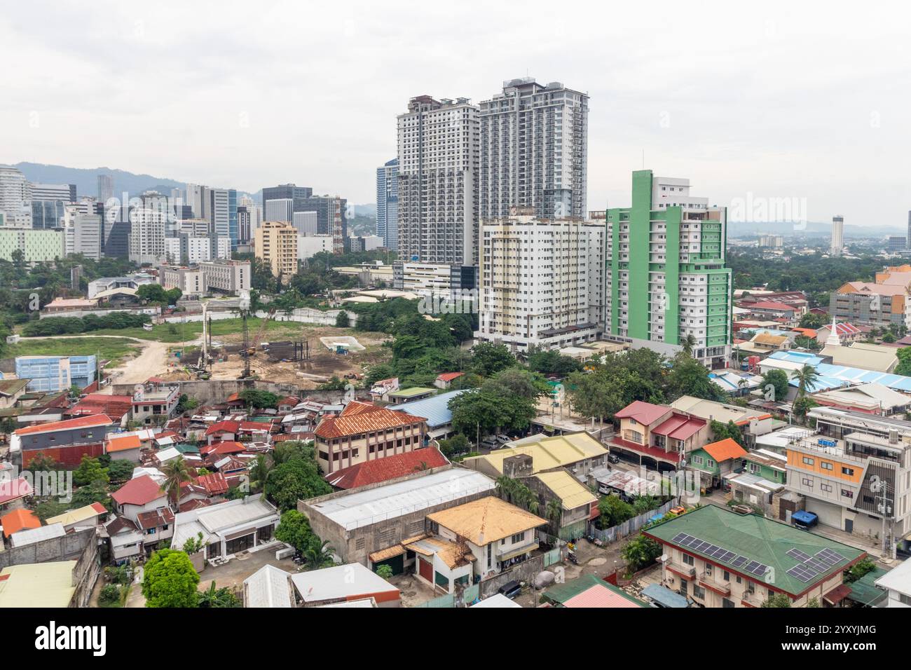 Built urban landscape of Cebu City with high-rise buildings, busy ...