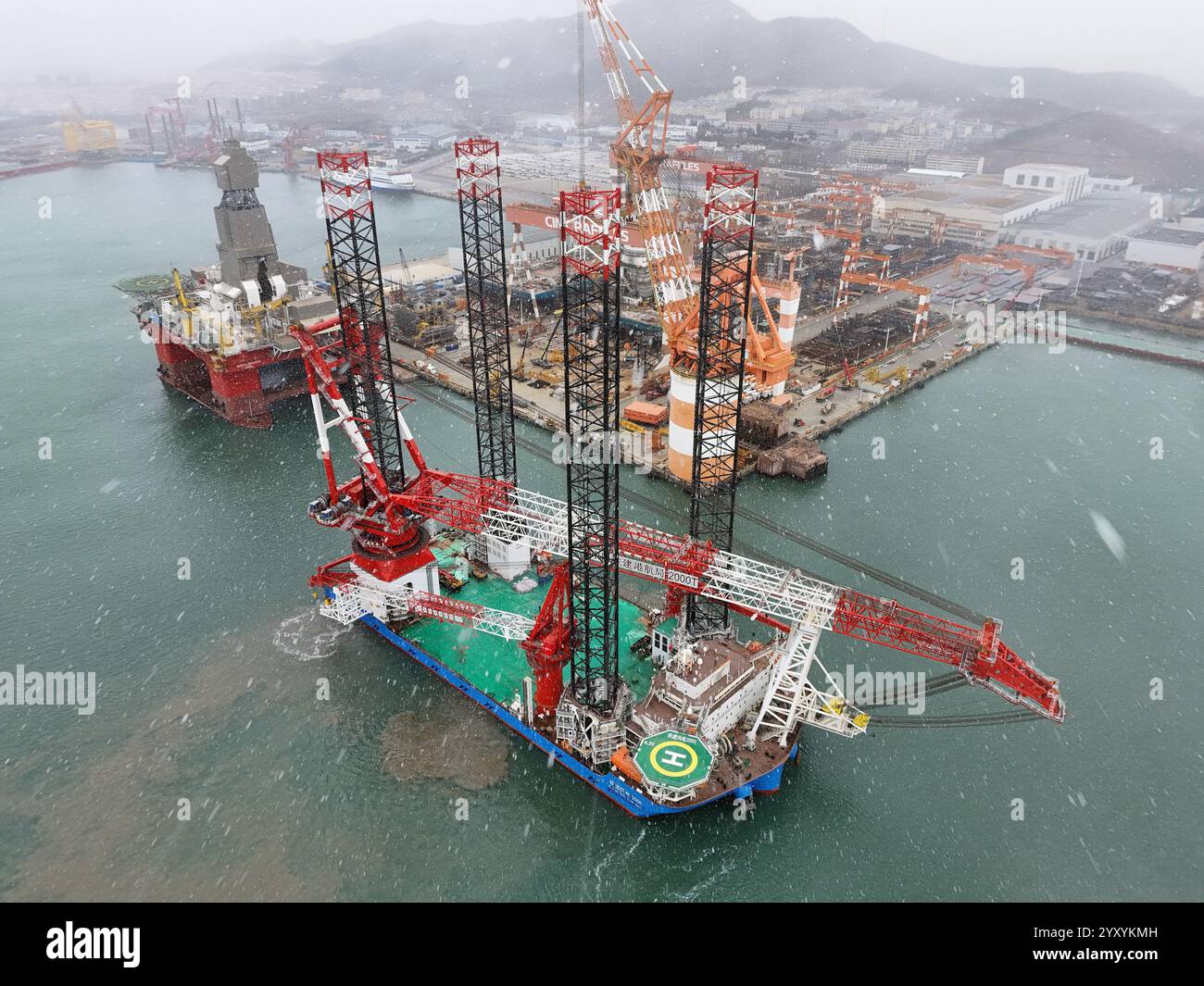 YANTAI, CHINA- DECEMBER 18, 2024 - The "Railway Construction Wind Power ...