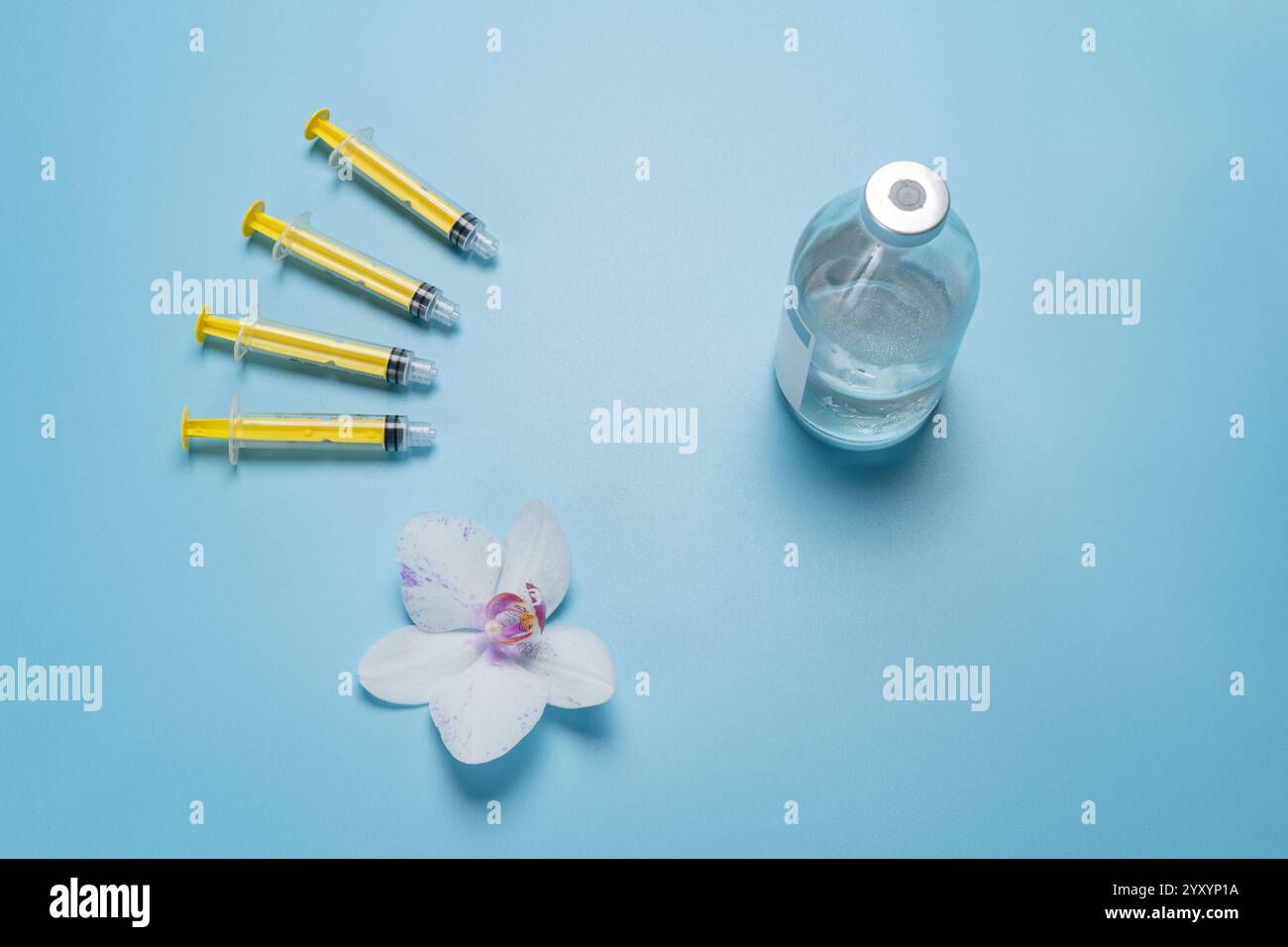 Plastic syringes with a bottle for liquid medicine Stock Photo - Alamy