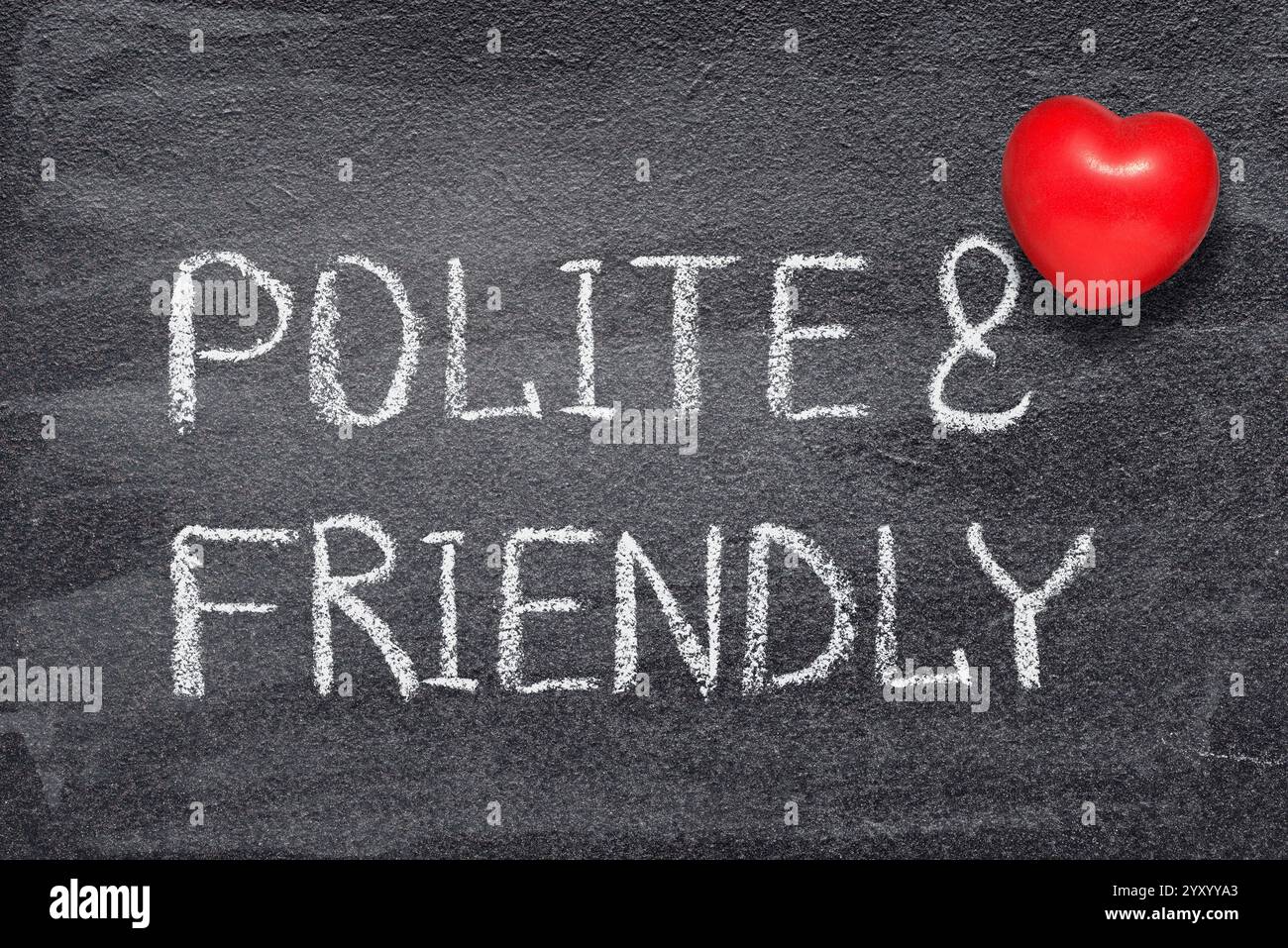 polite and friendly phrase written on chalkboard with red heart symbol ...