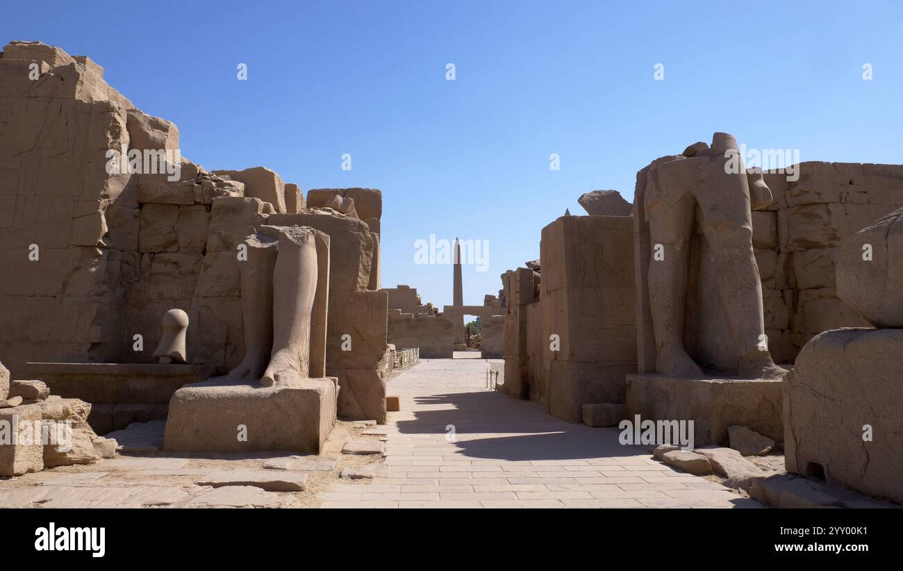 Obelisk of Thutmose I and colossus of Ramesses II in Karnak Temple in ...