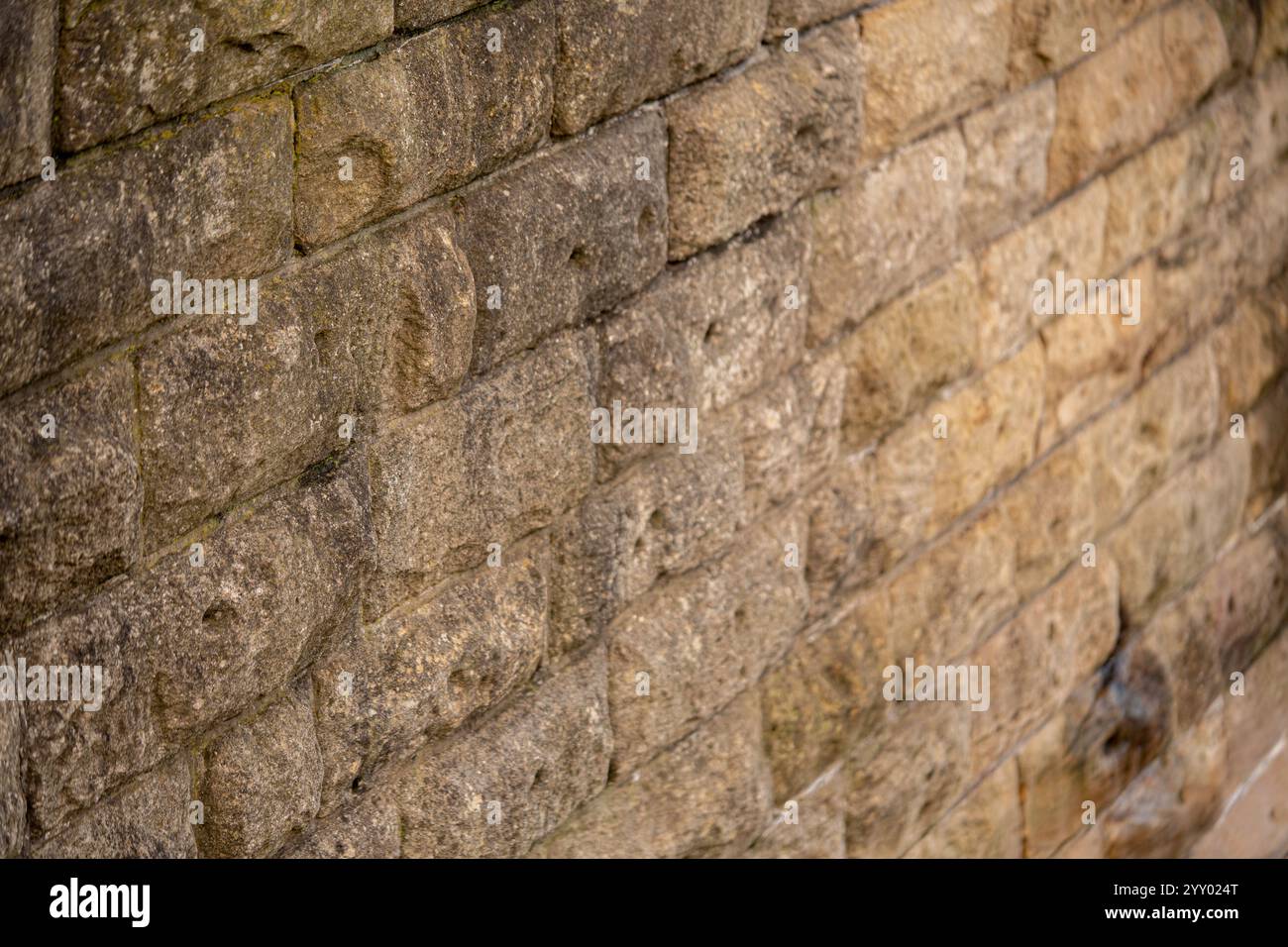 sandstone blocks forming a wall of a pier at saltburn, north yorkshire ...
