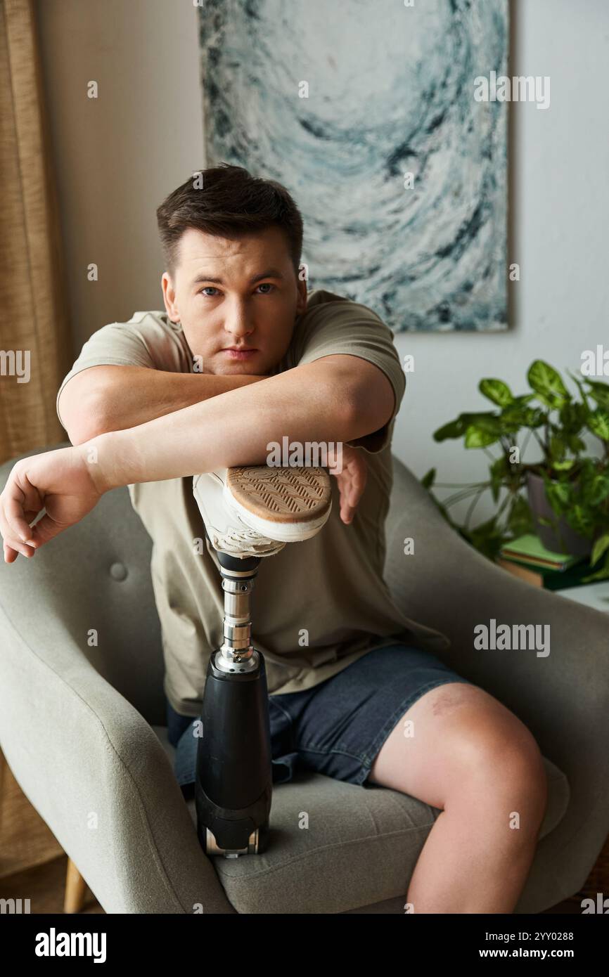 Man sitting on the arm chair hi-res stock photography and images - Alamy