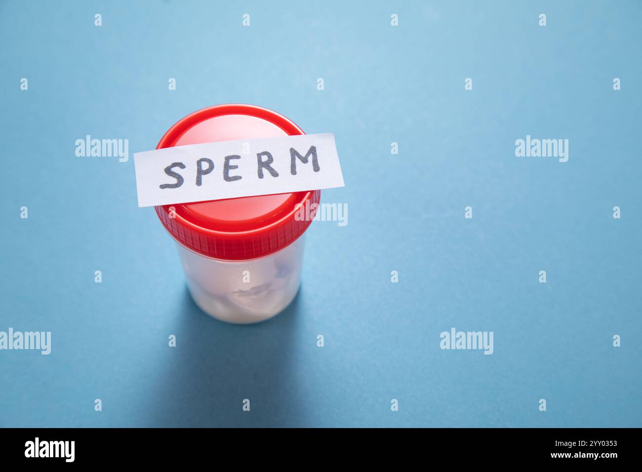 Sperm sample collection container Stock Photo - Alamy